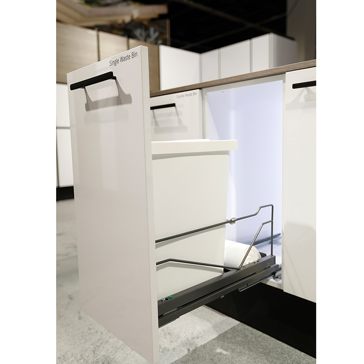 for the narrow single trash bin pull out - is the width adjustable? The ...
